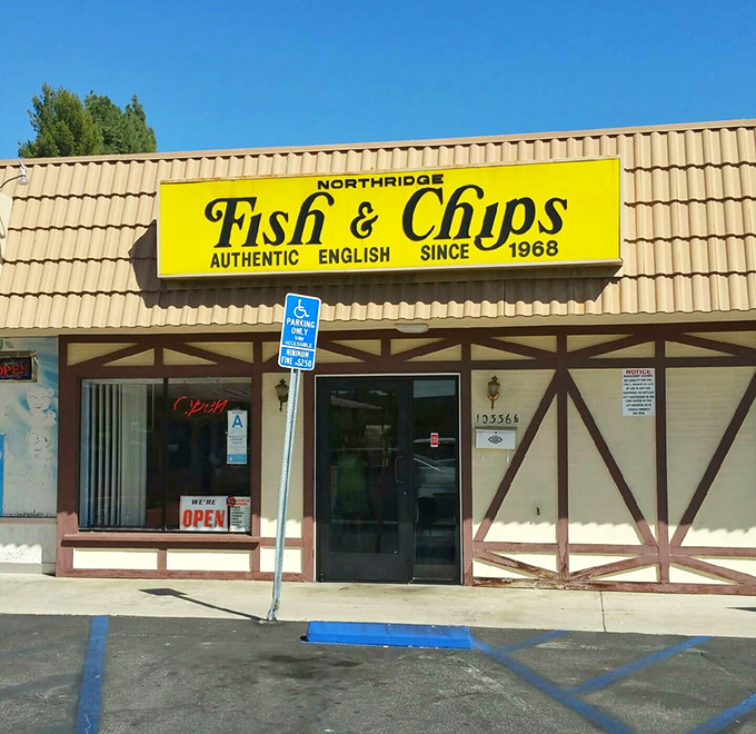 The entrance beckons like an old friend, promising comfort food that transcends trends. That yellow sign has guided hungry souls for generations.