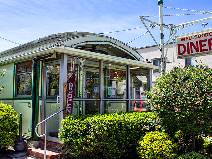 The entrance beckons with mint-green charm and the promise of comfort food that's stood the test of time against culinary fads.