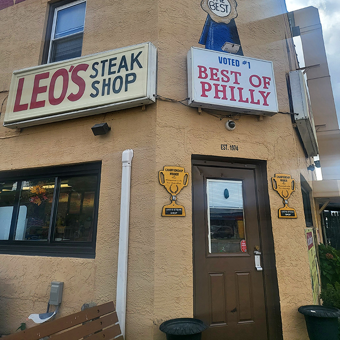 The doorway to deliciousness. Those championship plaques aren't just decoration&mdash;they're well-earned badges of cheesesteak honor.