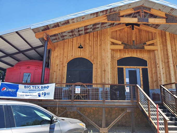The newer face of Big Tex, with wooden siding and a welcoming porch. That red caboose in the background hints at the railroad heritage that flavors Willcox.