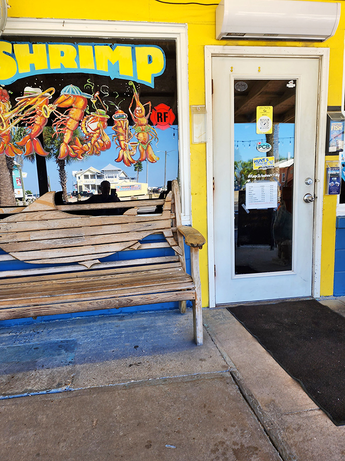 The entrance to Hunt's promises no pretense&mdash;just a bright yellow beacon guiding hungry travelers to seafood salvation.