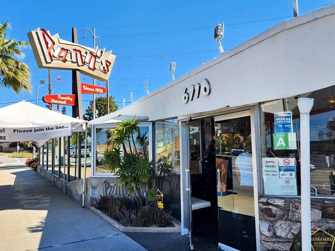 The entrance promises what's inside delivers&mdash;authentic mid-century charm with that unmistakable Googie architecture that screams "California classic."