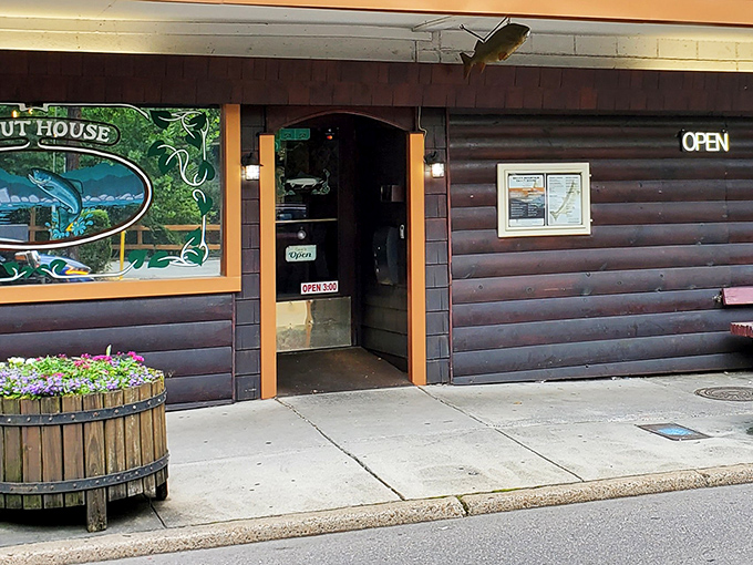 The unassuming entrance beckons like a secret fishing spot &ndash; no flash, no fuss, just the promise of honest-to-goodness mountain cooking waiting inside.
