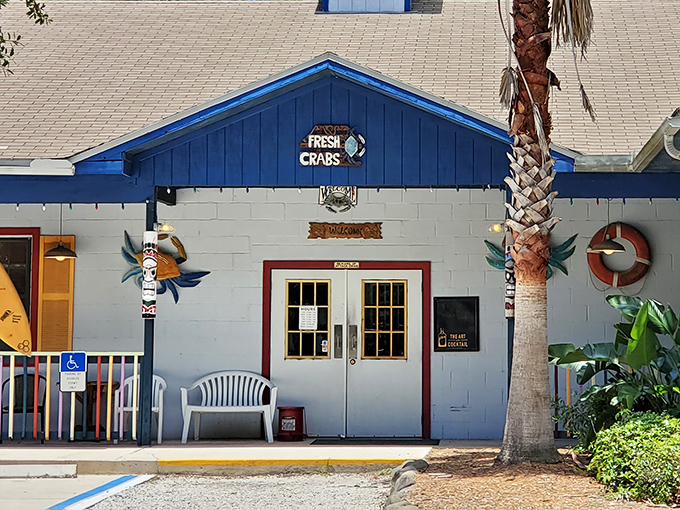 The entrance promises "FRESH CRABS" in neon, which is both a menu highlight and possibly the best welcome sign in Jacksonville.
