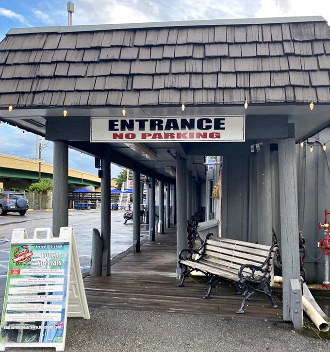 The entrance says "No Parking" but really means "No Hesitating." That lunch specials board is practically waving you inside.