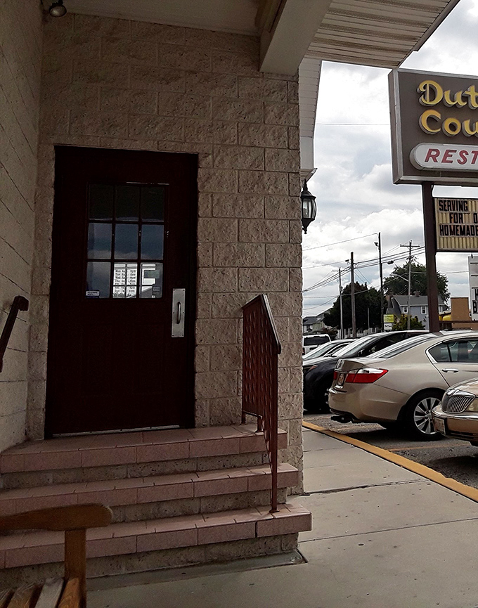 The entrance to culinary heaven, where parking spaces fill quickly once word spreads about excellence.