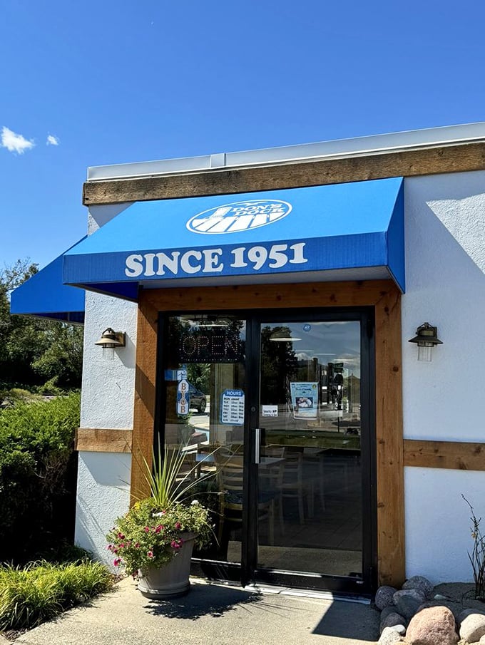 The blue awning proudly declares "SINCE 1951"&mdash;because when you've been doing something right for over 70 years, you've earned the right to brag a little.