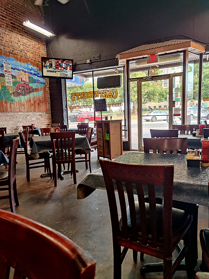 The dining room's simple elegance&mdash;wooden chairs, blue tablecloths, and brick walls&mdash;lets the food remain the undisputed star of the show.
