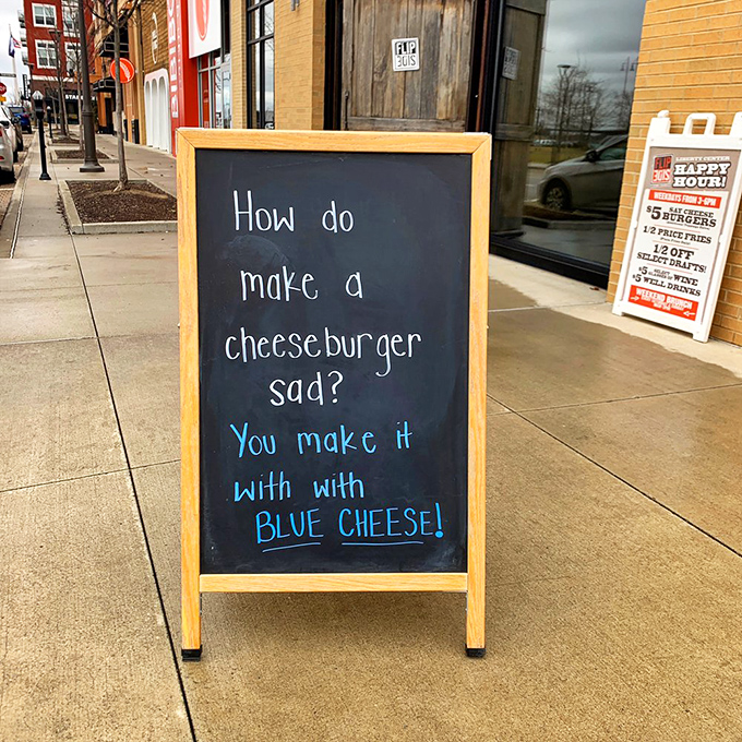 "How do you make a cheeseburger sad? You make it with BLUE CHEESE!" Dad jokes and burger wisdom&mdash;the sidewalk sign that keeps on giving.