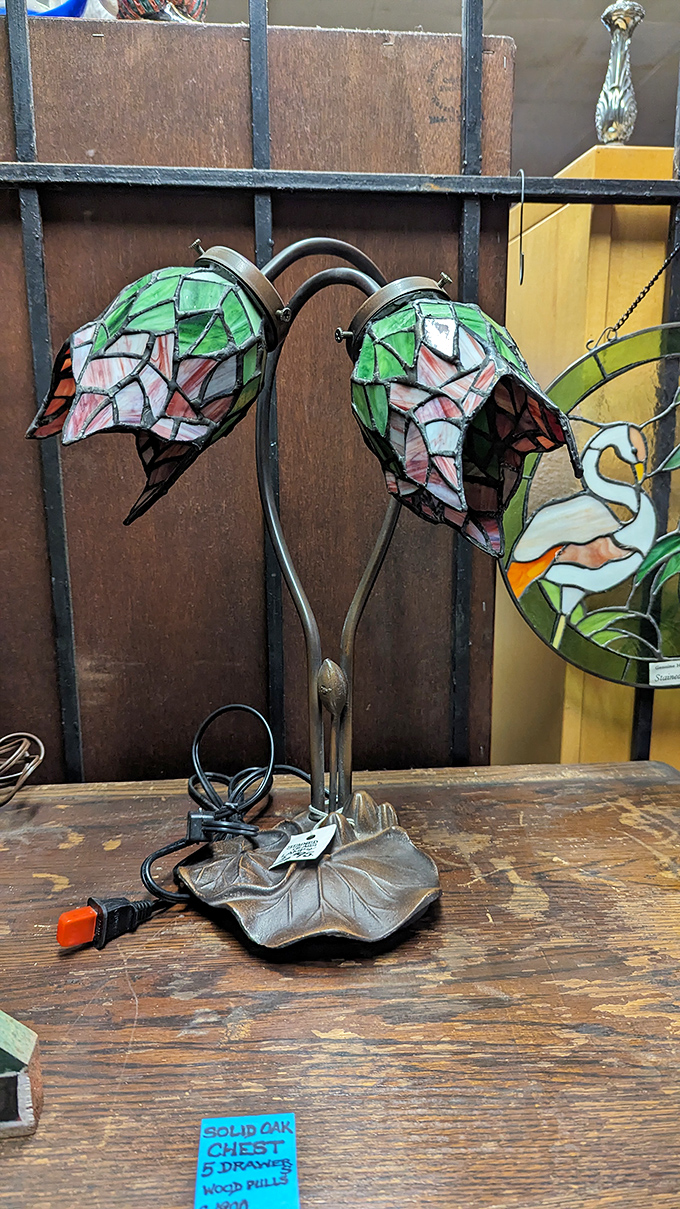 This Tiffany-style lamp doesn't just illuminate a room &ndash; it transforms it. Those stained glass flower shades bloom eternally, no watering required.