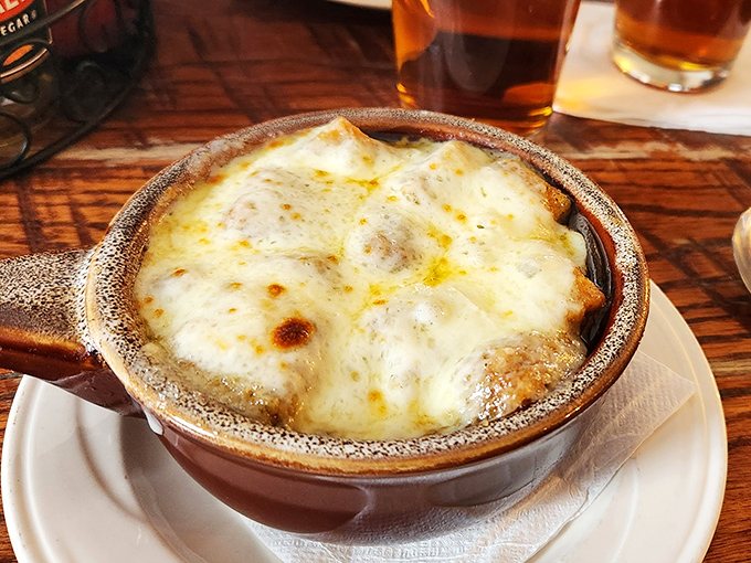 French onion soup done right&mdash;a bubbling cauldron of comfort that's worth the inevitable cheese-pull photo opportunity.