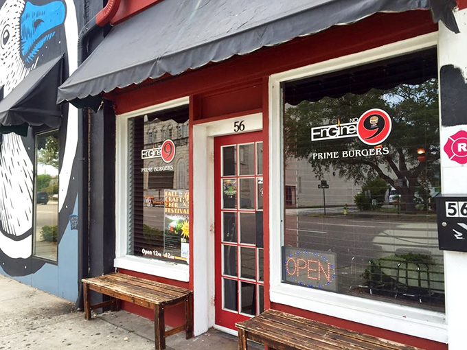The red door marks the entrance to burger nirvana. Like all great journeys, this one begins with a single step toward deliciousness.