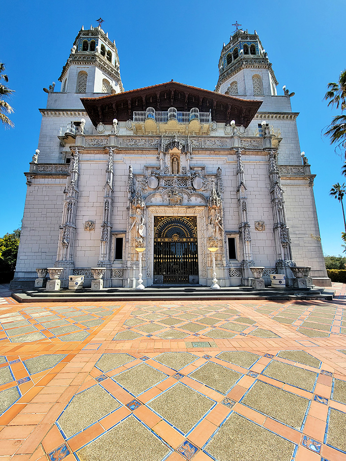 The ornate fa&ccedil;ade features more intricate stonework than most people have Instagram followers. Those twin towers aren't compensating for anything&mdash;they're just showing off.