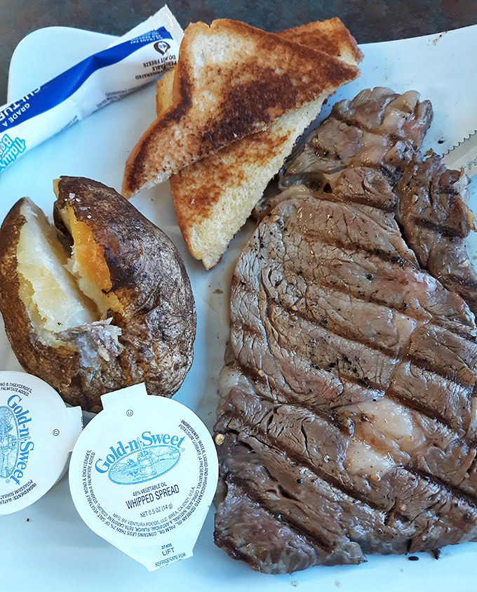 A steak that needs no introduction, just a good knife and your undivided attention. Simple perfection on a white plate.