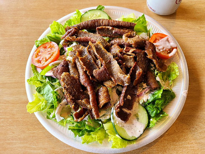 A gyro salad that proves healthy eating doesn't mean sacrificing flavor&mdash;tender meat atop crisp greens creates the perfect guilt-free indulgence.