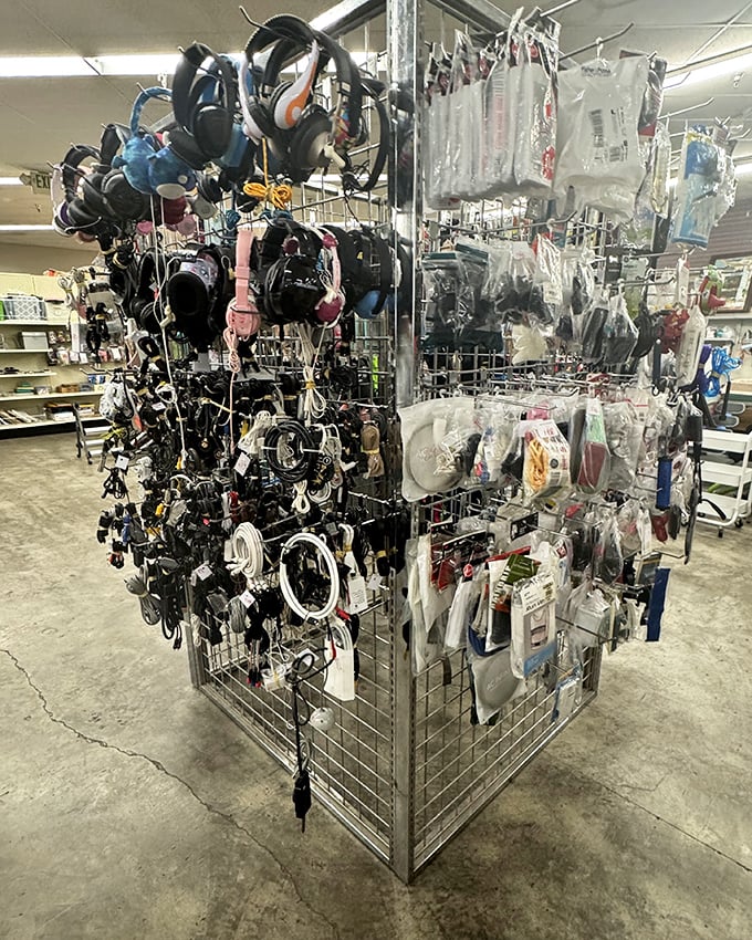 The accessories rack&mdash;a tangle of headphones, cables, and modern necessities. Yesterday's must-haves at tomorrow's garage sale prices.