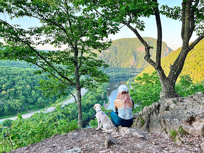 Finding perspective at 1,000 feet: where humans and their companions become properly sized against the grandeur of the Delaware River's handiwork.