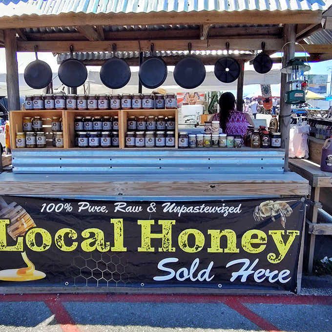 Liquid gold from Tennessee hills. Those cast iron skillets hanging above suggest exactly how to enjoy that local honey&mdash;on a fresh biscuit.
