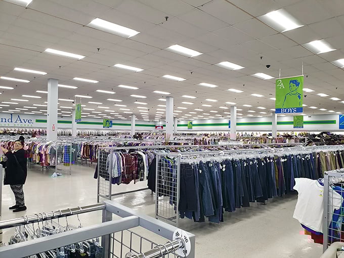 The vast interior stretches like a retail cathedral where bargain hunters come to worship savings.