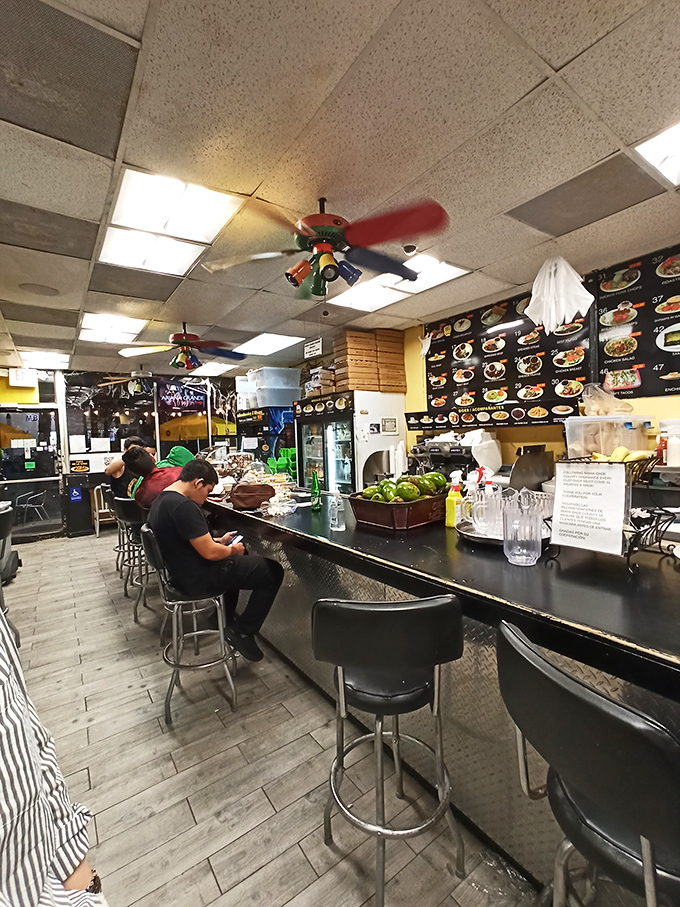 Ceiling fans spin lazily overhead as diners perch at the counter, creating the perfect backdrop for the kind of meal memories that last years.