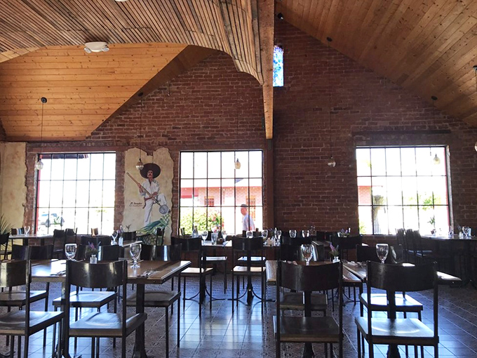 The dining room's soaring ceilings and abundant natural light create an atmosphere that makes you want to linger long after your plate is clean.