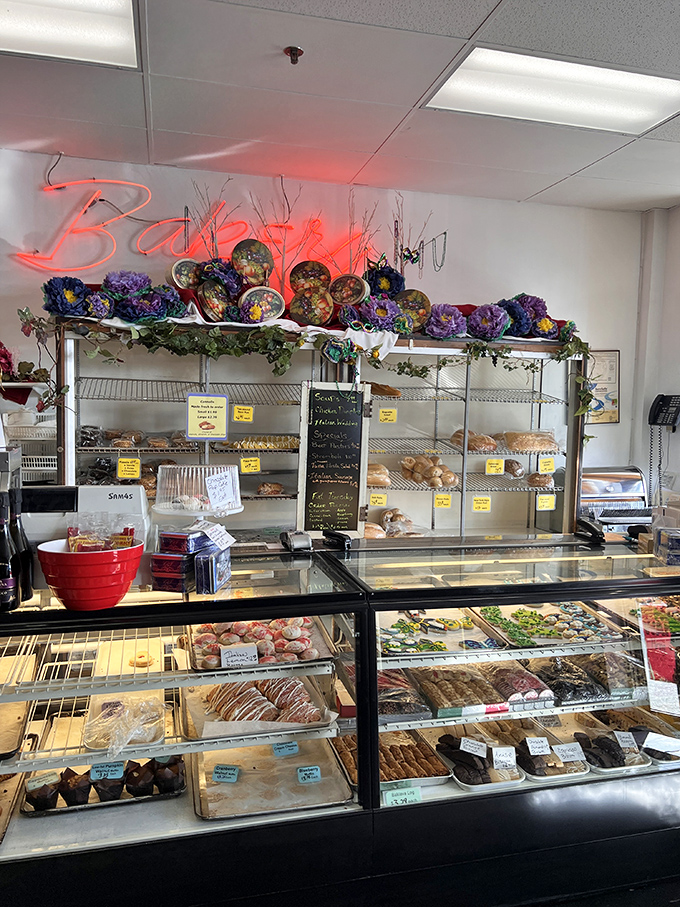 The bakery section, where that glowing "Bakery" sign and decorative plates create an atmosphere that says, "Yes, calories consumed here don't count."