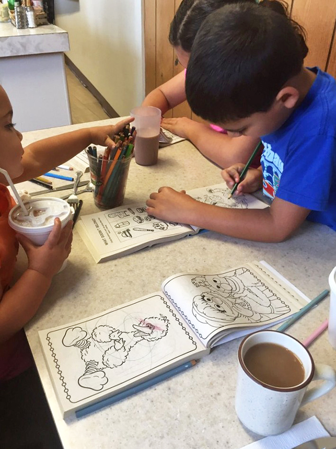 Young artists at work, proving Mom's Kitchen feeds creativity along with hungry bellies.