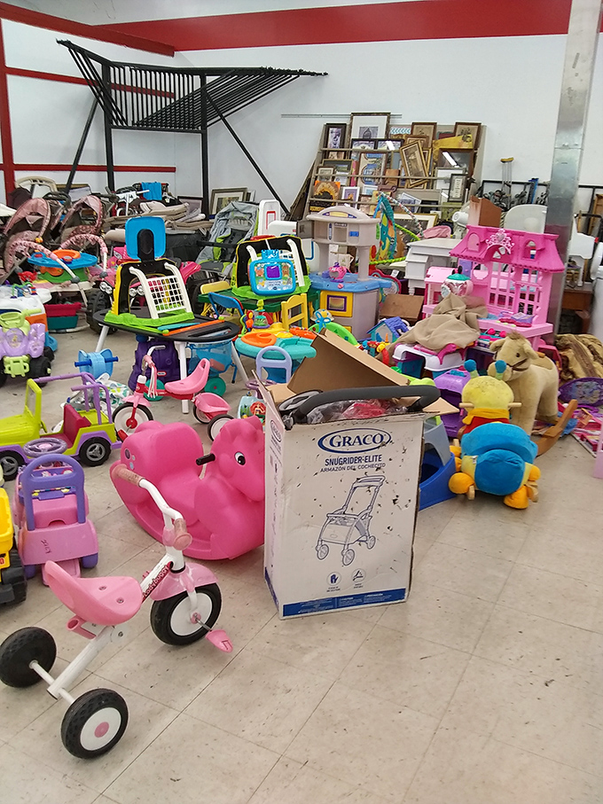 Pink tricycles and rocking horses await their next tiny riders. Childhood joy recycled and ready for new adventures at a fraction of retail therapy prices.