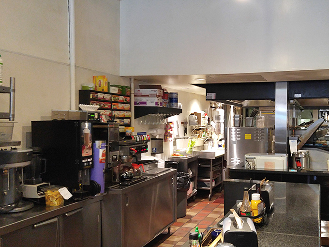 The kitchen may not be fancy, but it's where the magic happens—efficient, clean, and humming with the energy of people who know exactly what they're doing.