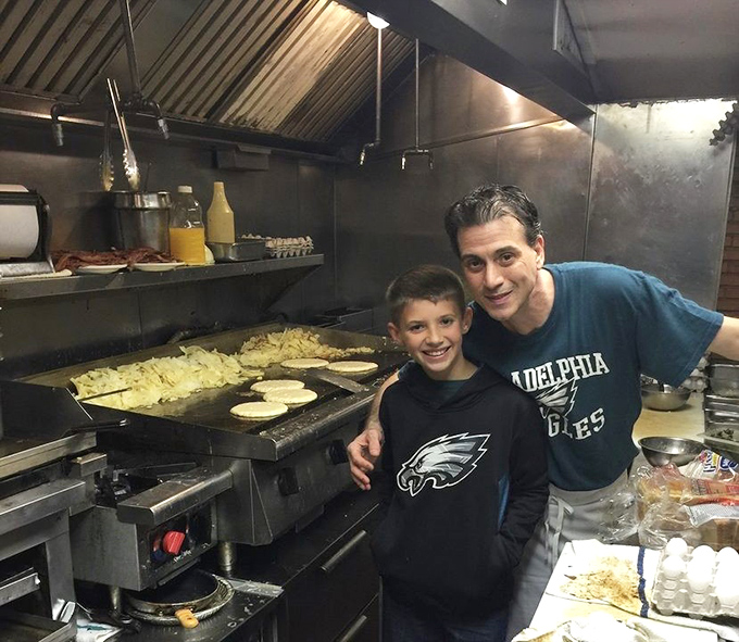 Behind the scenes magic where breakfast dreams come true. That griddle has probably seen more eggs than a chicken farmer's convention.