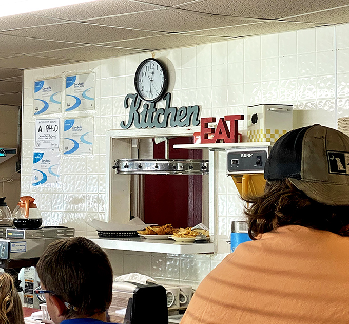 The pass-through window where breakfast dreams come true. No fancy terminology or garnishes&mdash;just hot plates delivered with care and efficiency.