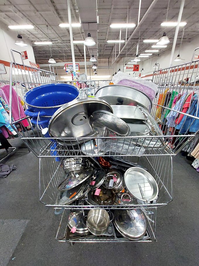Kitchen treasures await new homes in this cart. From professional-grade pots to quirky serving dishes, these tools have meals left in them yet.