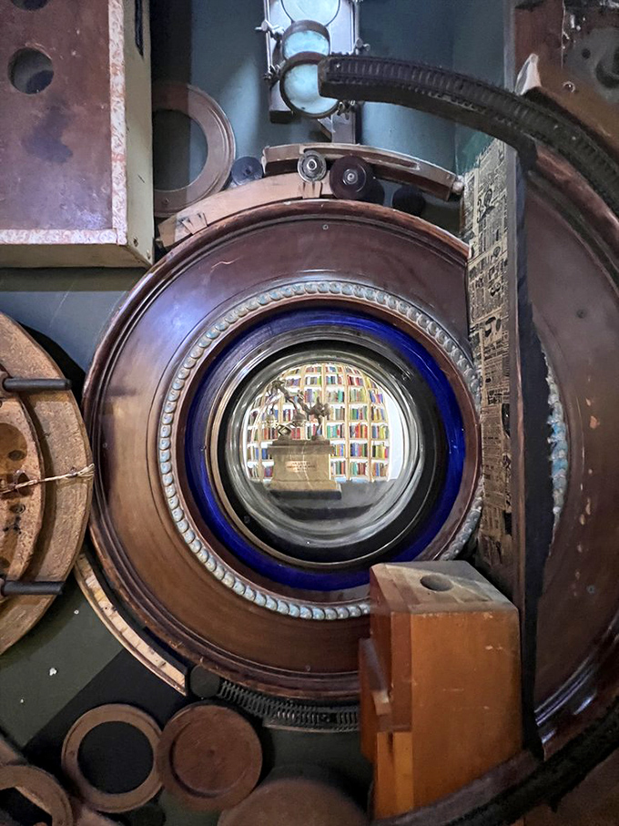 Peering through this steampunk-inspired portal reveals books within books—a meta moment worthy of your most literary Instagram post.