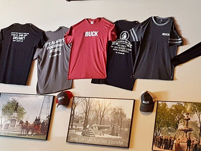 The merch wall proves you're not just visiting a restaurant but joining a community. These shirts tell stories between washes.