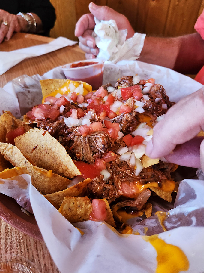 Nachos that require strategy &ndash; each chip a potential vehicle for the perfect ratio of pulled pork, cheese, and fresh pico de gallo.