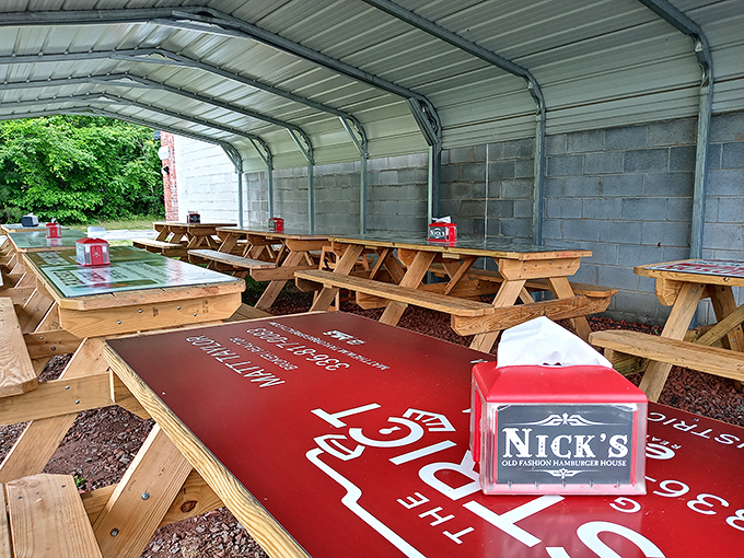 Picnic tables under cover offer al fresco dining without the fresco drama – perfect for enjoying burgers in any weather.