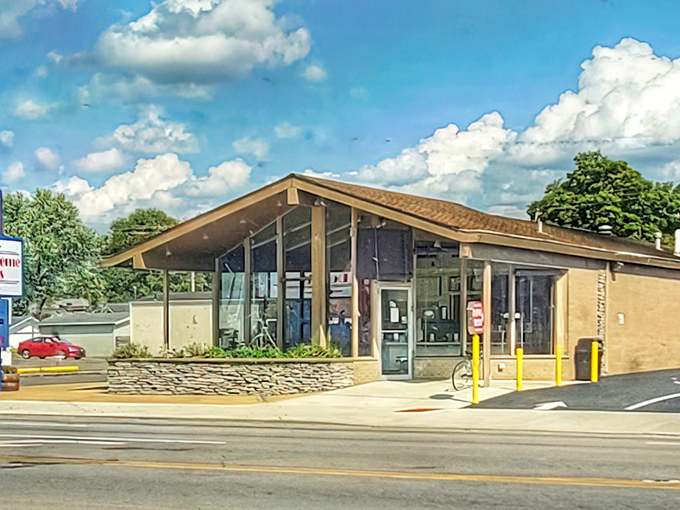 Even the parking lot whispers promises of the sweet treasures waiting just beyond those humble doors.