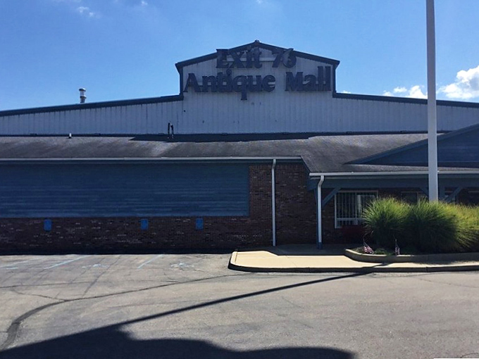 The blue-trimmed exterior stands as a humble guardian of the treasures within, like a librarian who doesn't judge your reading choices.