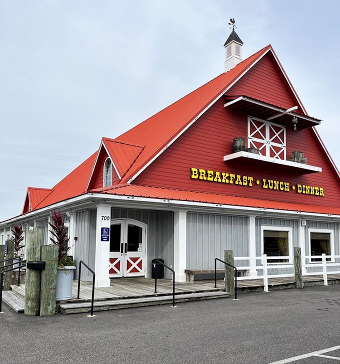 That red roof and weathered wood exterior isn't just country charm&mdash;it's a promise that authenticity awaits inside those barn doors.