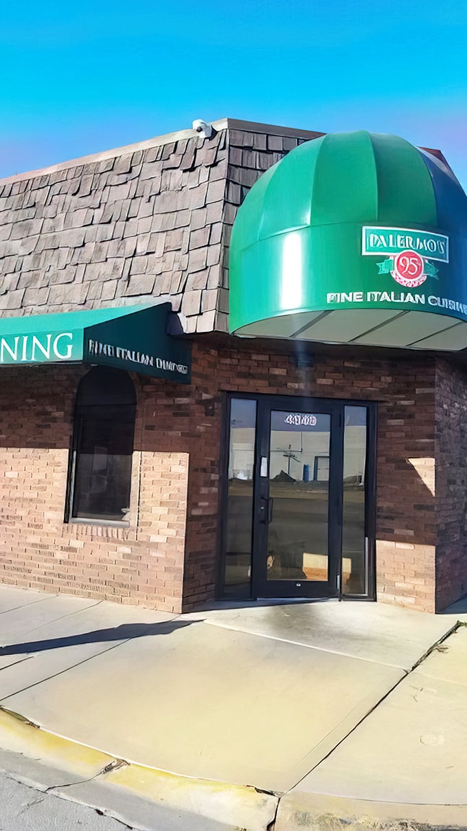 The exterior might be humble brick, but that emerald awning announces with confidence: "Serious Italian food happens here."