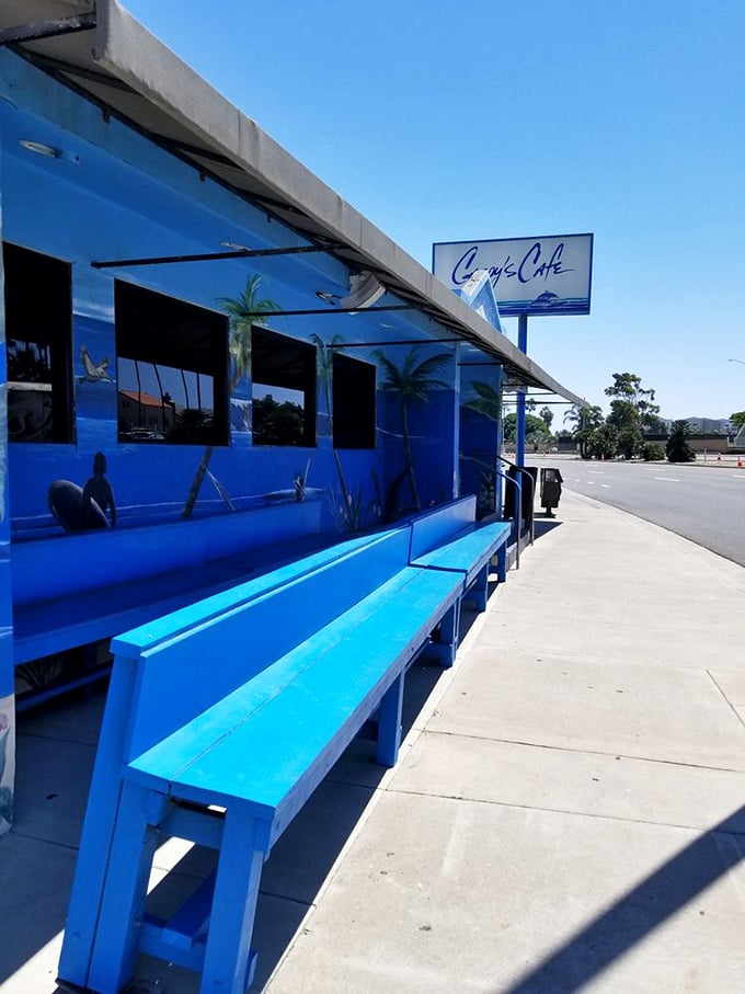 The bright blue bench outside offers a sunny spot to wait for your table while contemplating life's big question: sweet or savory breakfast today?