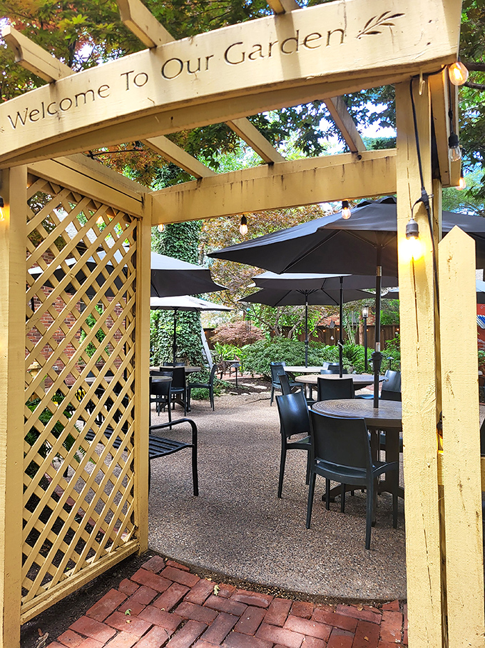 "Welcome to Our Garden" isn't just a sign – it's a promise. This outdoor oasis offers al fresco dining where string lights and nature create the perfect ambiance.