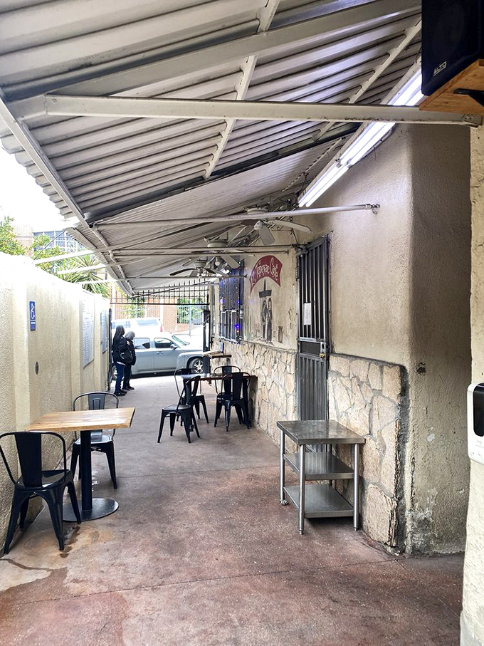 The outdoor seating area offers a moment of calm before the flavor storm that awaits inside &ndash; a casual prelude to serious eating.