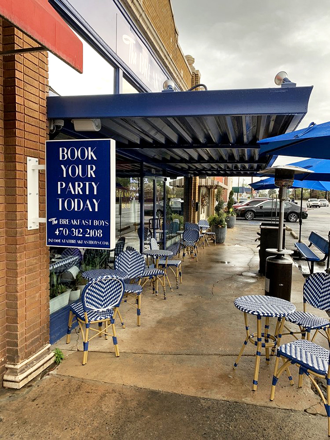 The sidewalk seating area invites you to enjoy your breakfast al fresco, with those signature blue umbrellas providing shade for your mimosa.