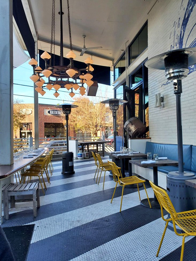 The outdoor patio with its cheerful yellow chairs offers the perfect perch for people-watching while savoring the day's catch in Atlanta's temperate weather.