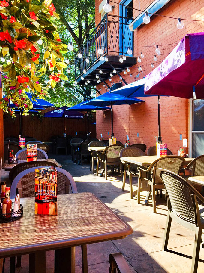 Outdoor seating that captures that magical French Quarter courtyard feeling. Those string lights aren't just illumination&mdash;they're tiny stars blessing your dining experience.