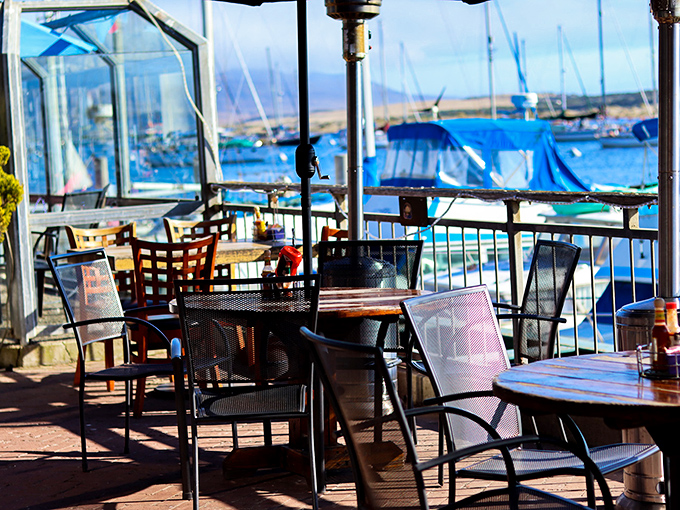 Outdoor tables positioned with mathematical precision for maximum view-to-bite ratio. Seafood algebra at its finest.