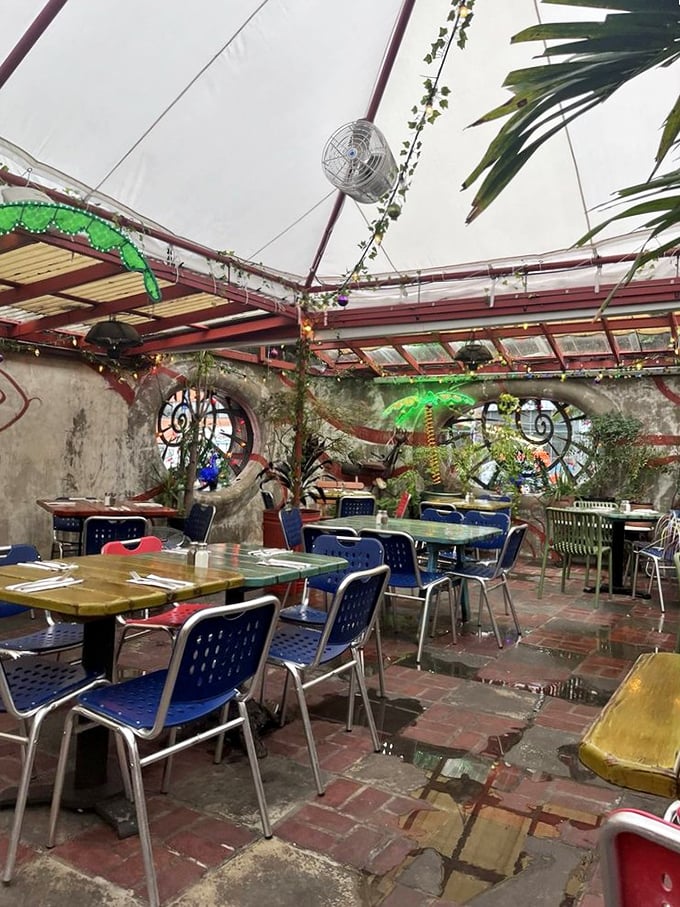 The outdoor garden feels like stumbling into a secret urban oasis, where brick floors meet whimsical decor and conversations flow as freely as mimosas.