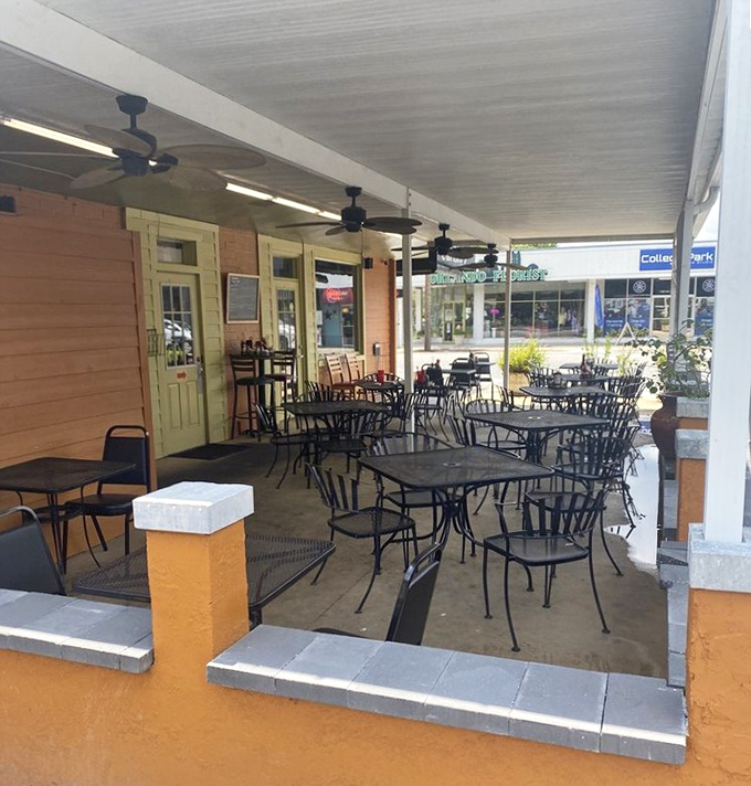Outdoor dining Florida-style: where the ceiling fans keep you cool while the food warms your soul.