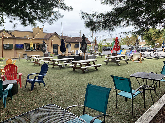 Outdoor picnic tables scattered across green space create an instant backyard party vibe. Perfect for those Pennsylvania days when sunshine feels like a personal gift.
